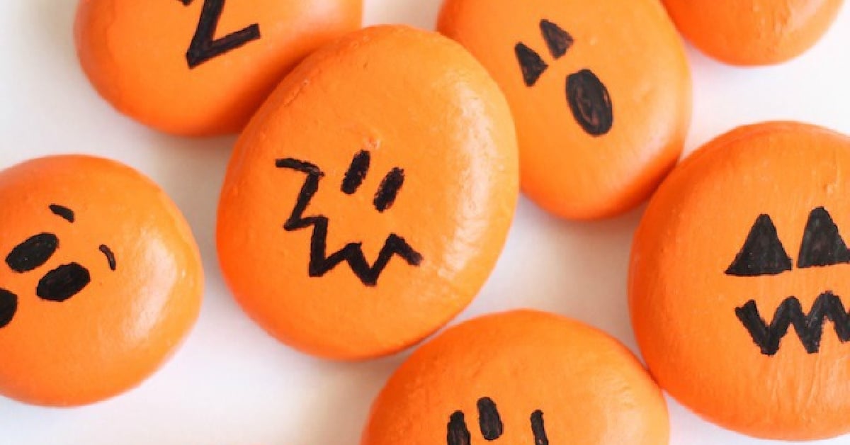 Cute Halloween Painted Pumpkin Rocks for Play | Kids Activities Blog